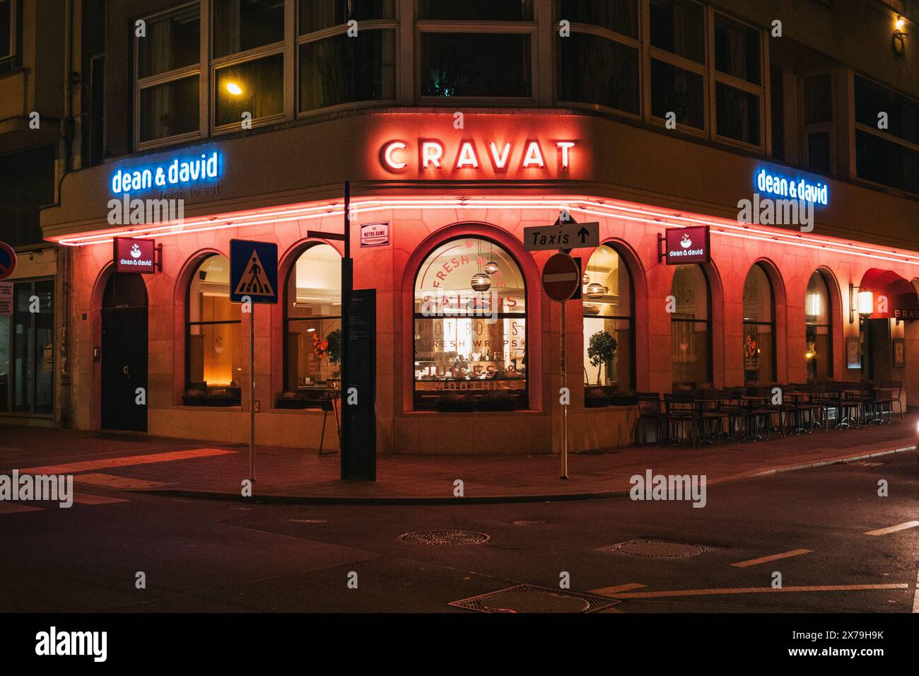 The Cravat Hotel in Luxembourg City glows under warm lights at night ...