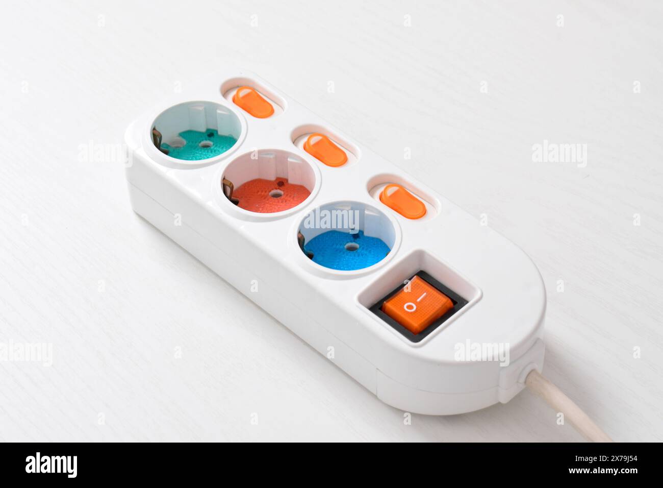 White Electrical plug in outlet socket at home isolated on white ...