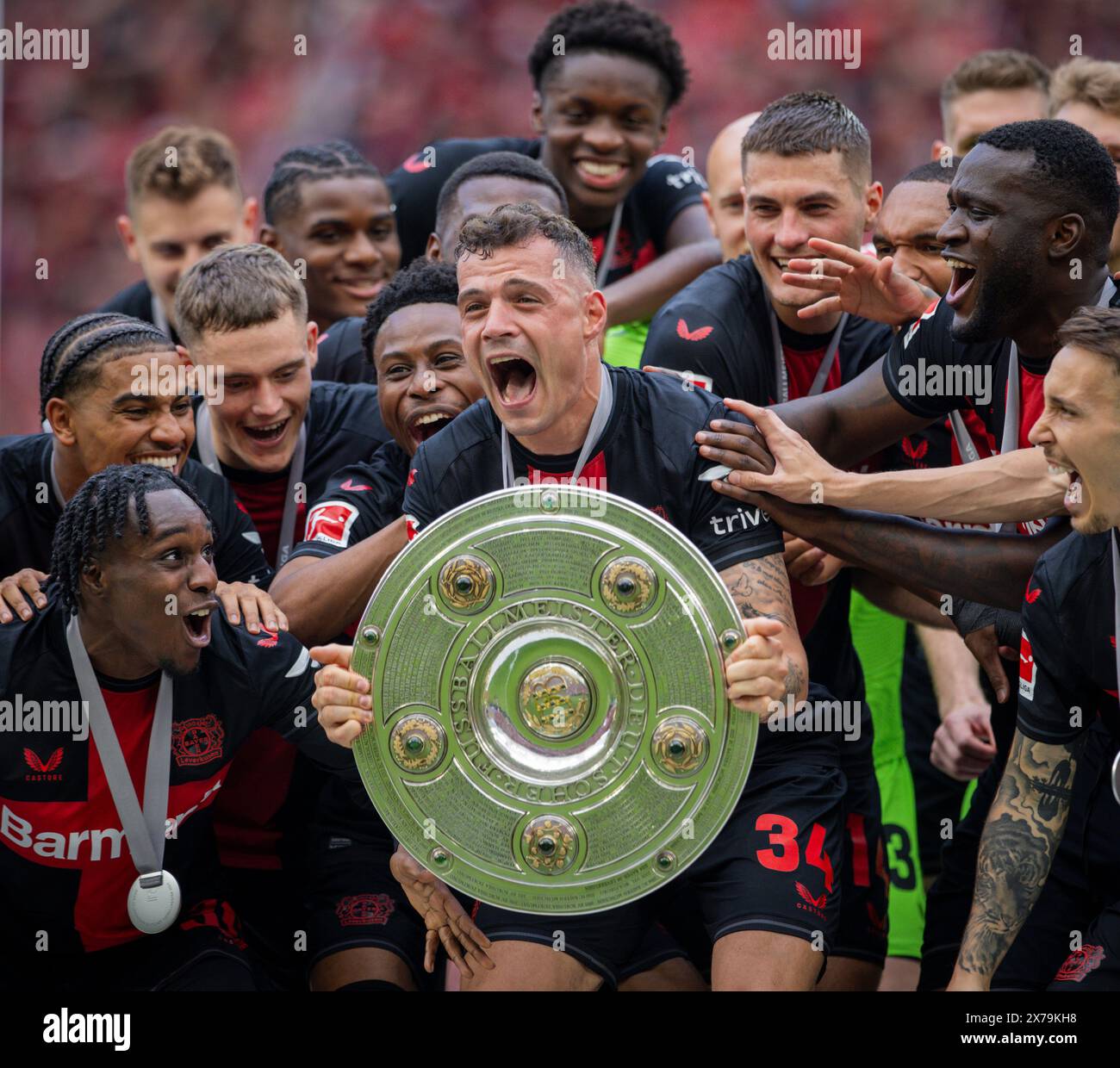 Leverkusen, Germany. 18th Mai 2024. Granit Xhaka (Leverkusen) mit Meisterschale,Jeremie Frimpong ...