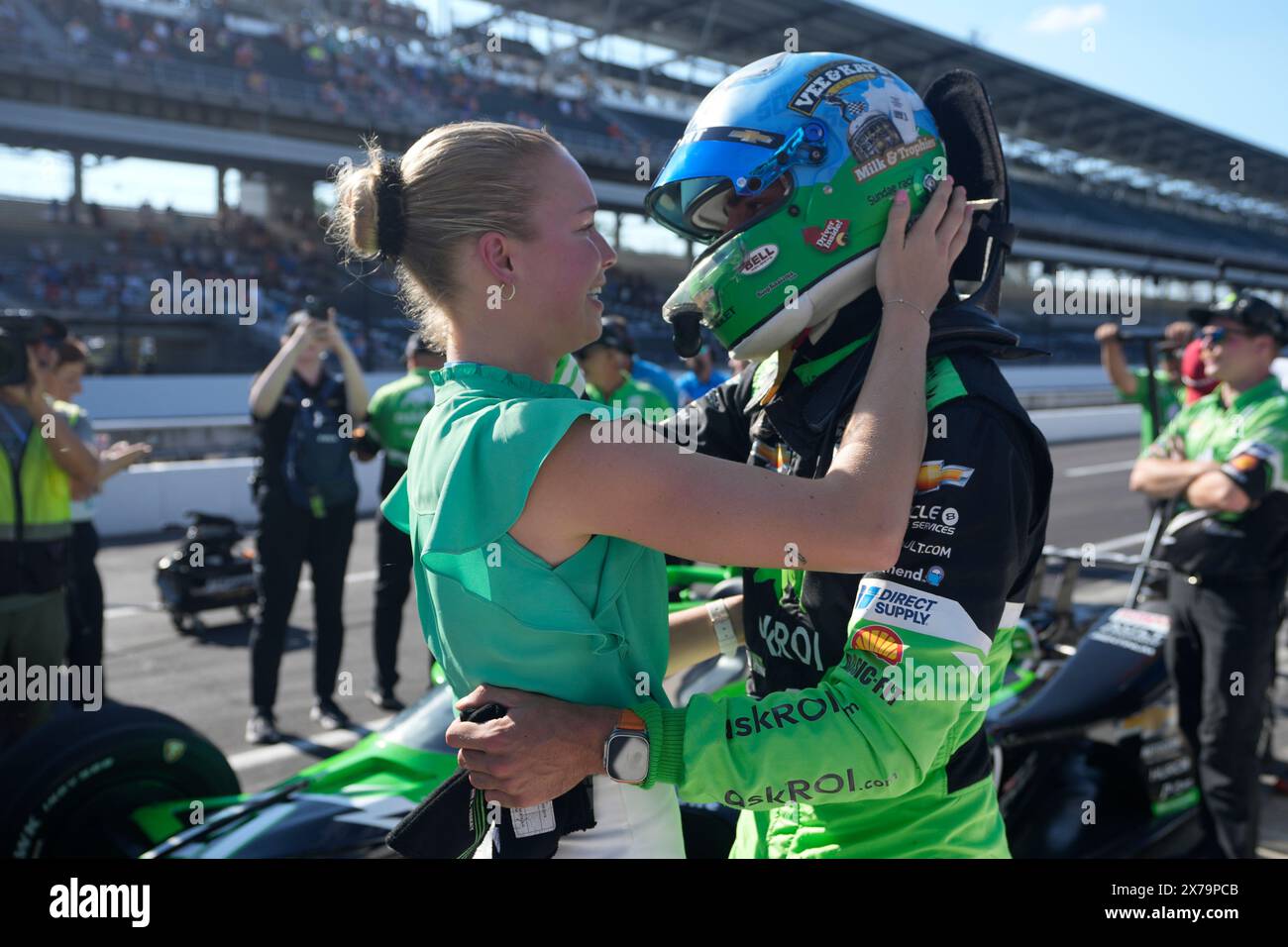 Rinus VeeKay, of The Netherlands, get a hug from his wife, Carmen van ...