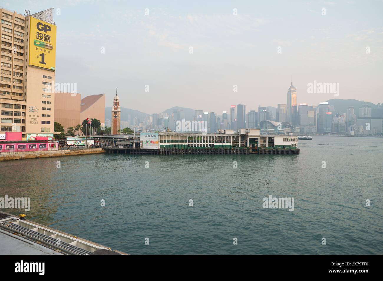 HONG KONG, CHINA - DECEMBER 05, 2023: view of former Kowloon-Canton Railway Clock Tower and Star ...