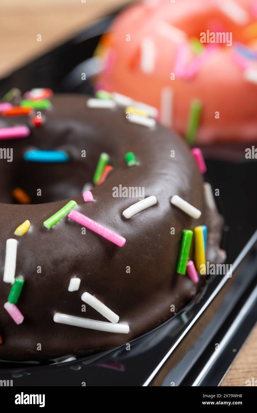angle view sweet donuts vertical composition Stock Photo - Alamy