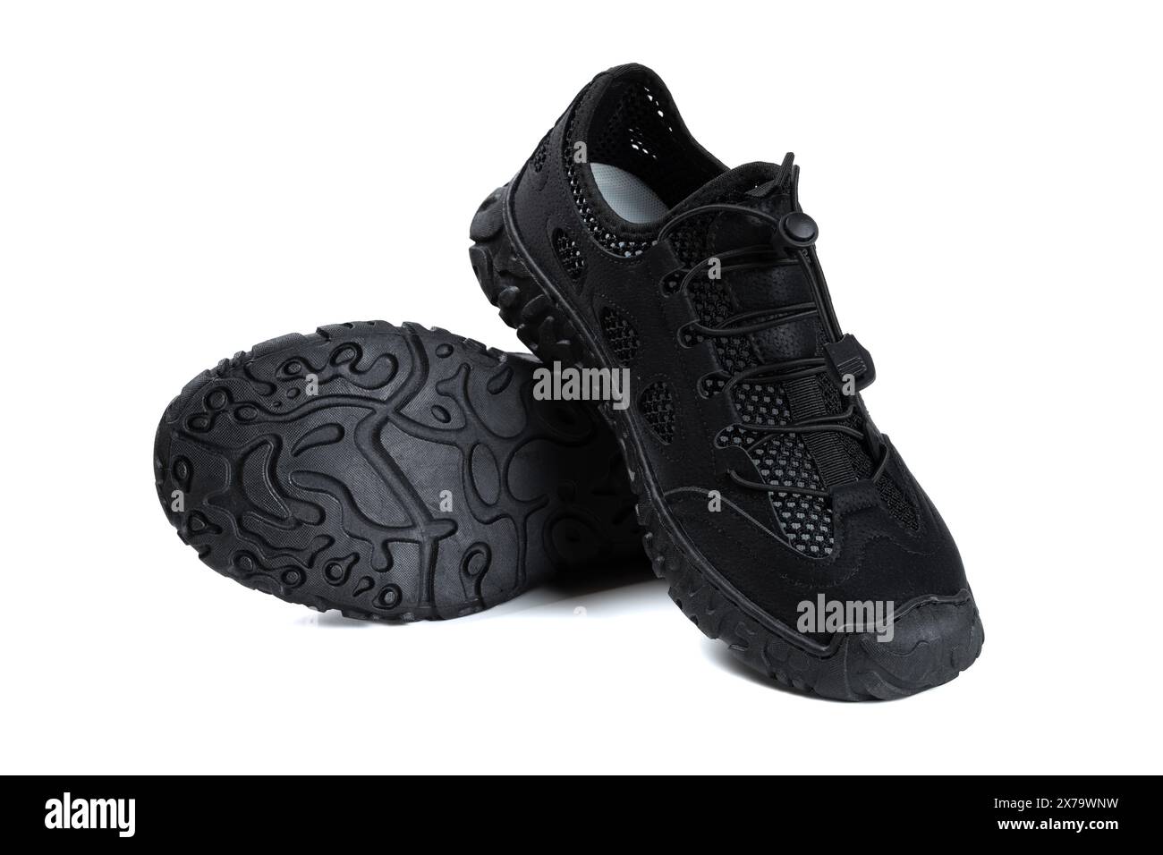 black ventilated sports shoes for men on white background Stock Photo ...