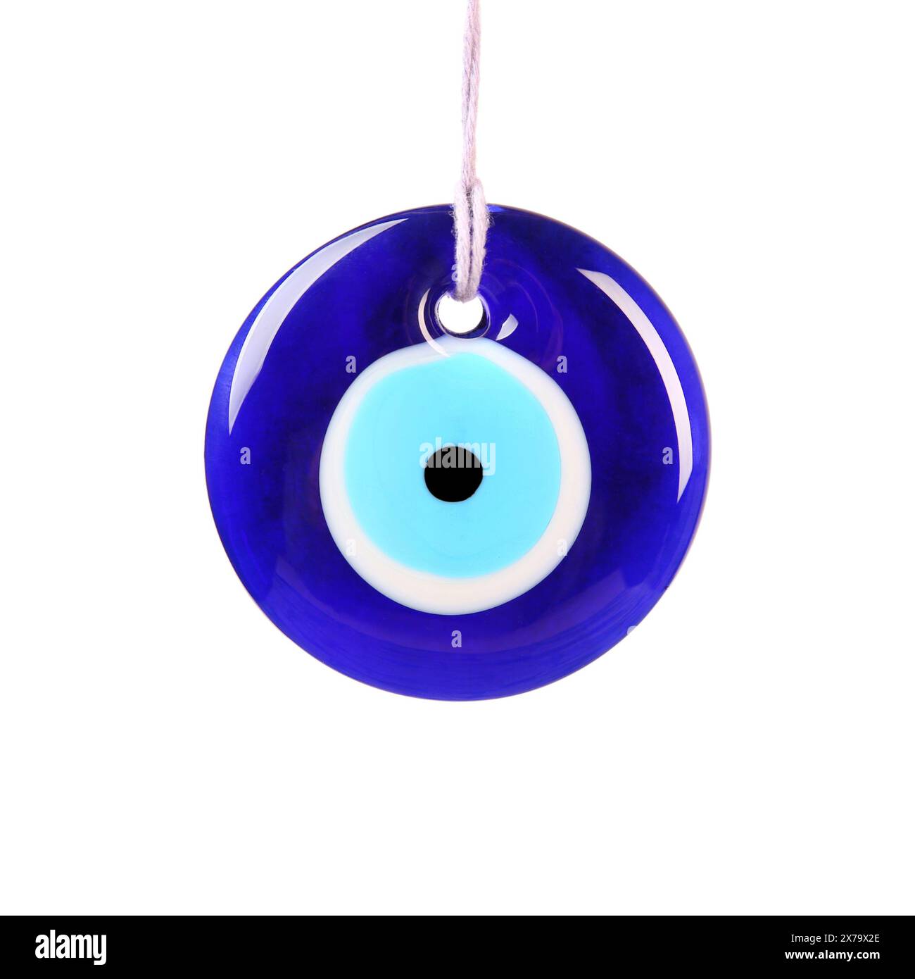 Evil eye amulet hanging on white background Stock Photo - Alamy