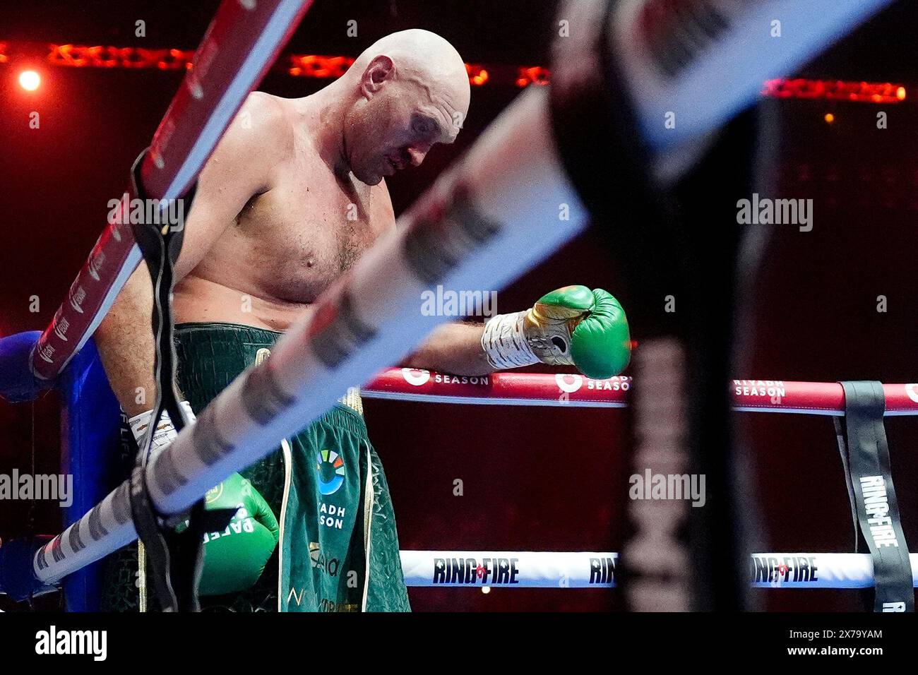 Tyson Fury (right) reacts after Oleksandr Usyk landed a punch during ...