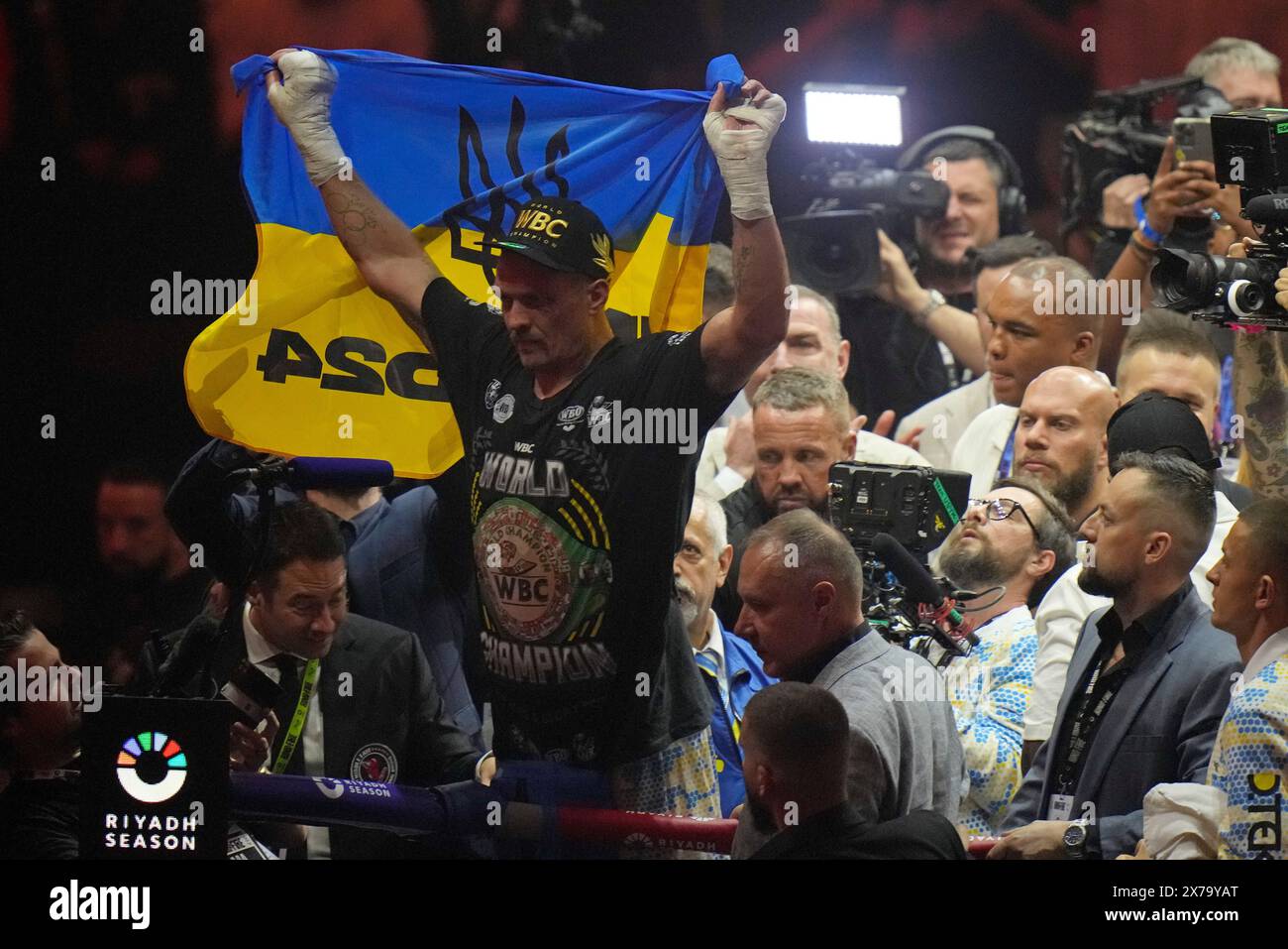 Ukraine's Oleksandr Usyk celebrates after beating Britain's Tyson Fury ...