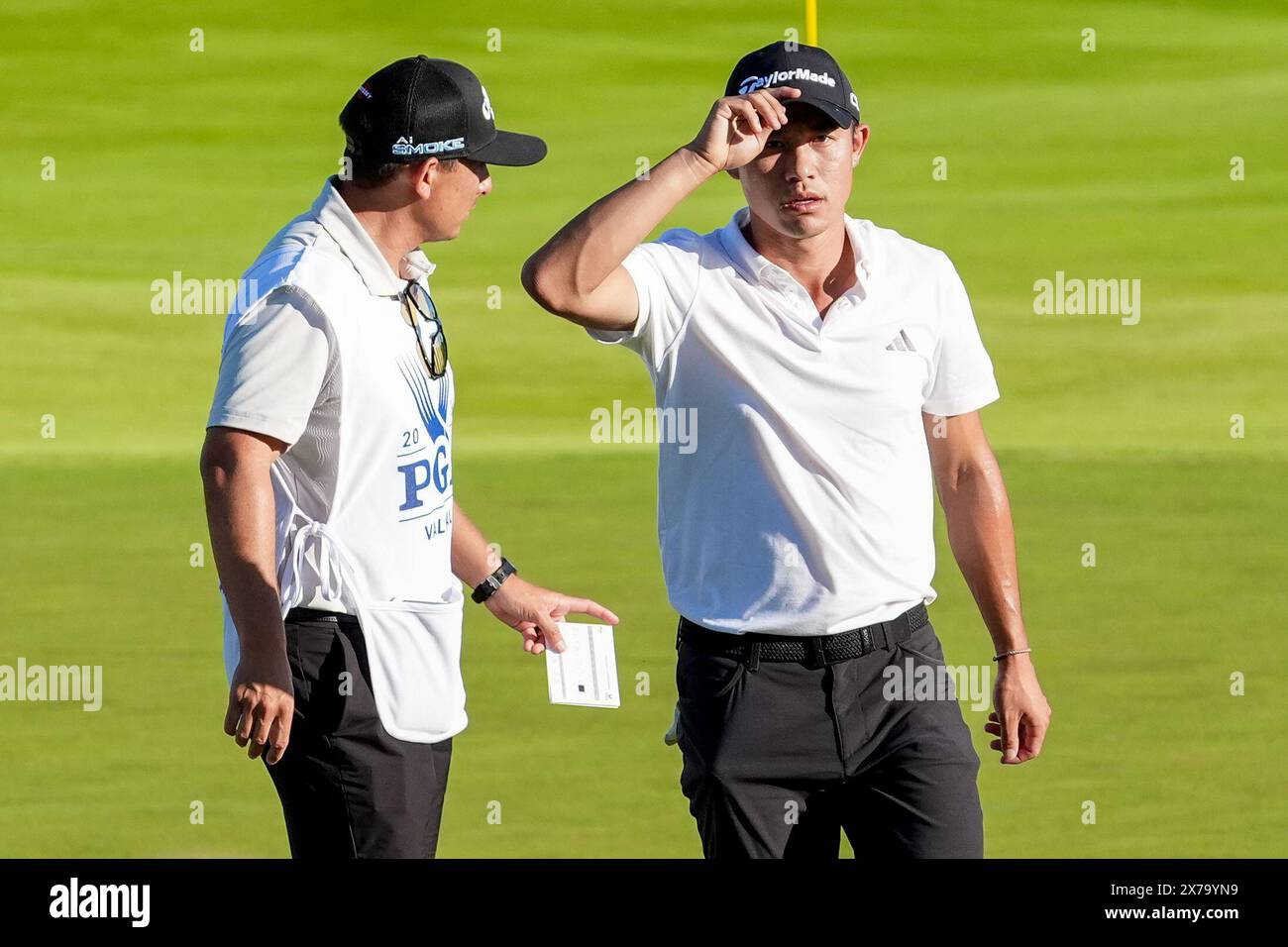 Louisville, Kentucky, USA. 18th May, 2024. Collin Morikawa (R) and his ...