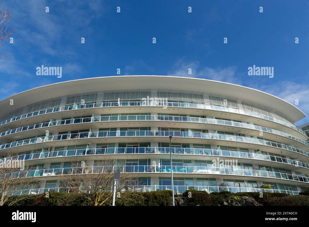 View of a luxury condominium development along Songhees Walkway in ...