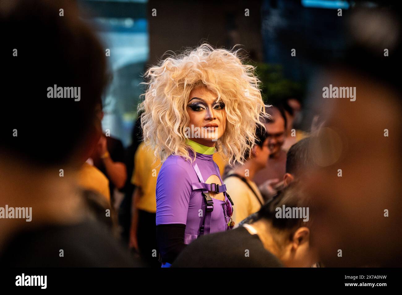 Thailand. 18th May, 2024. A drag queen arrives to the event in 80s ...