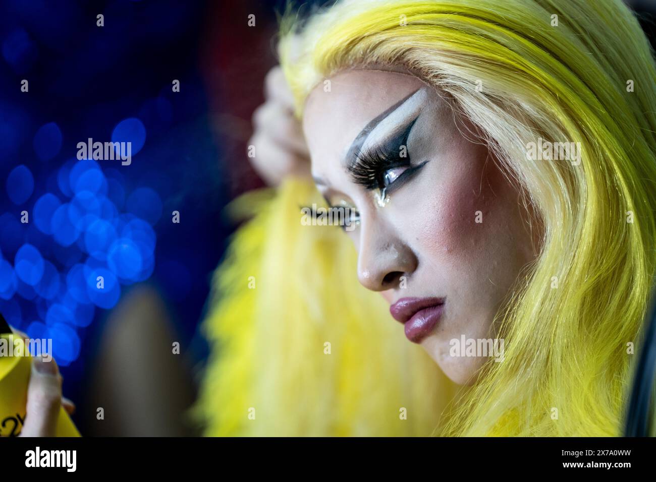 Thailand. 18th May, 2024. Nymphia Wind touches up her makeup backstage ...