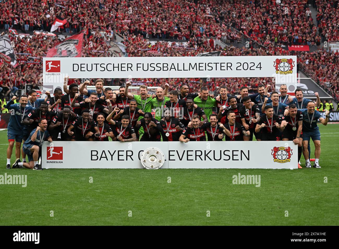 Leverkusen, Germany. 18th May, 2024. Team Bayer 04 Leverkusen pose for ...