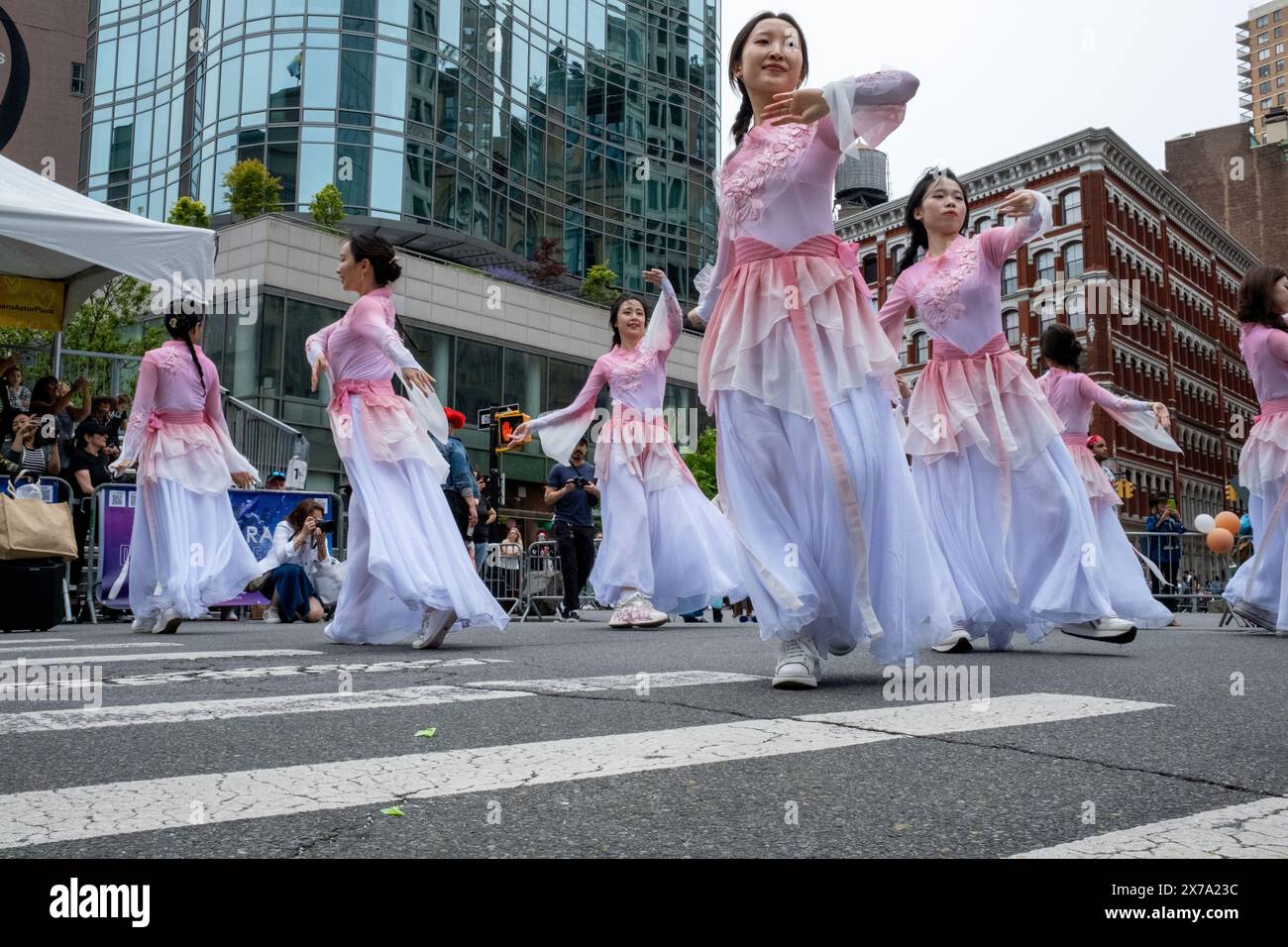 New York, United States. 18th May, 2024. Asian dancers perform in front ...