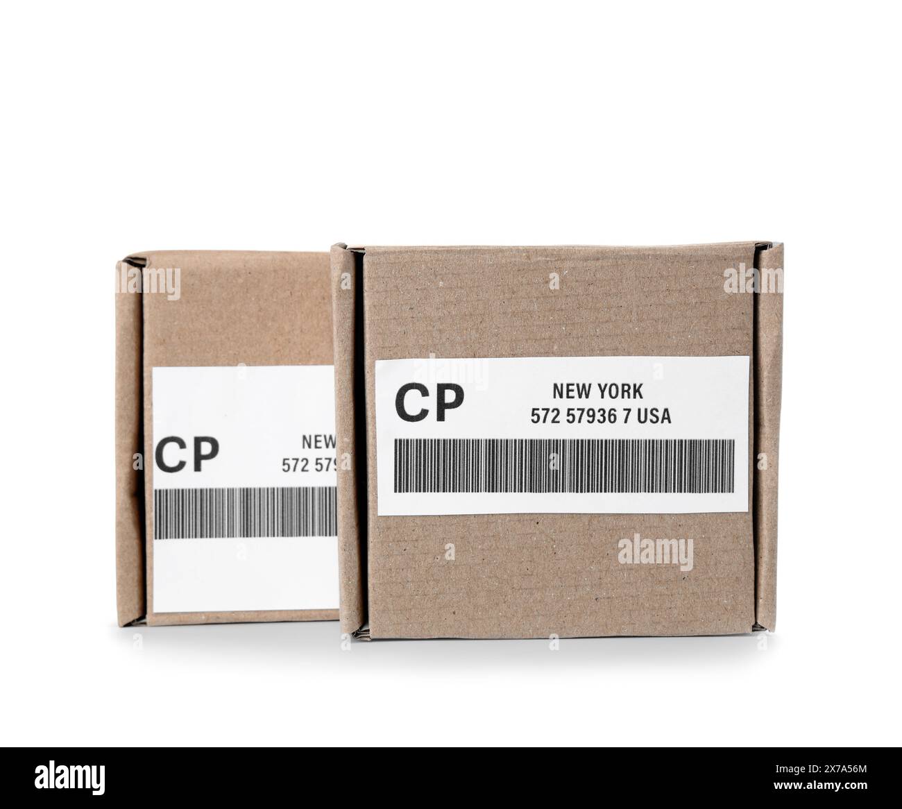 Cardboard packages with shipping labels and barcodes on white ...