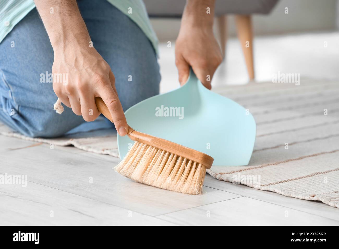 Man sweeping floor hi-res stock photography and images - Alamy