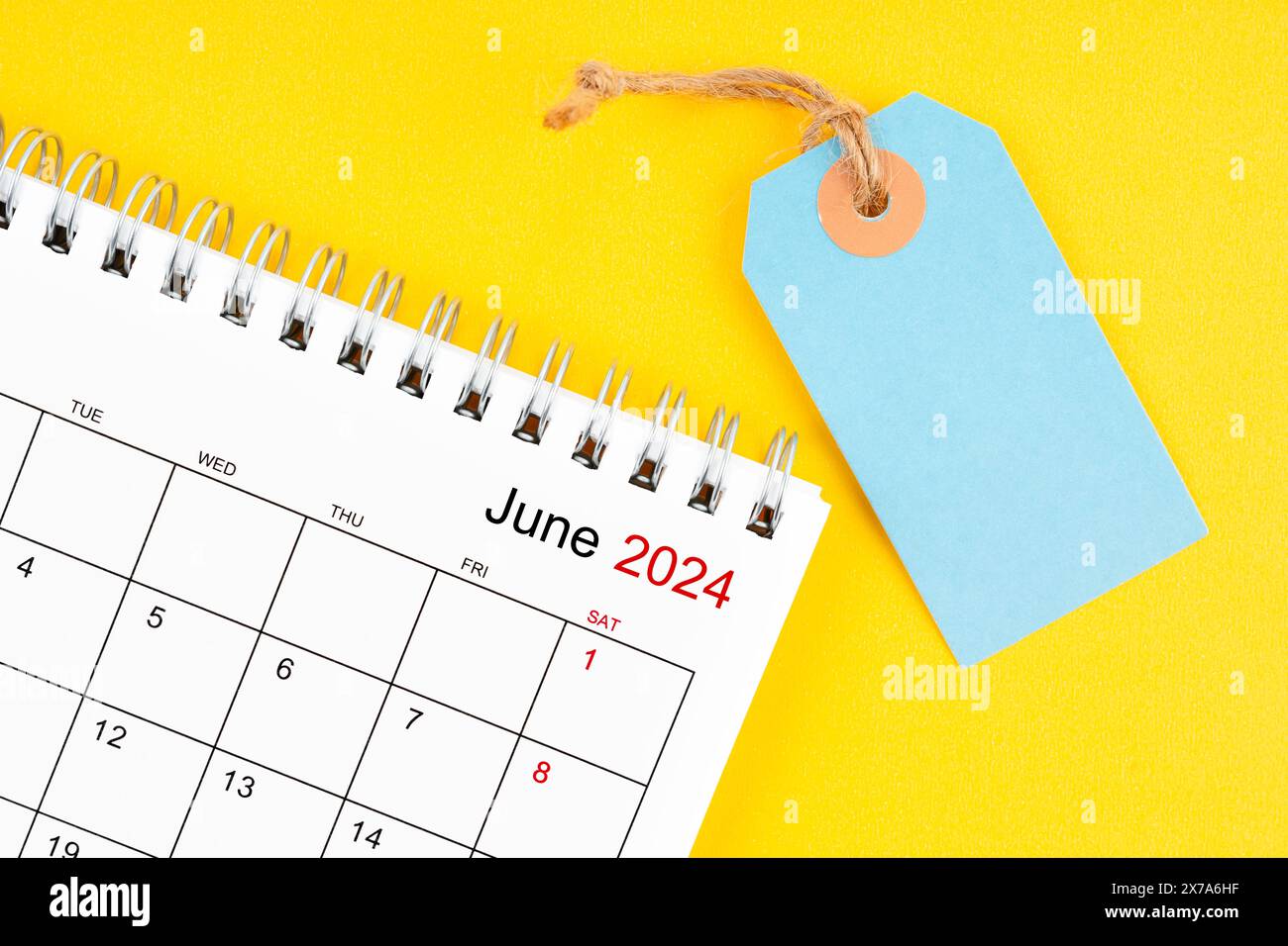 June 2024 desk calendar with blank price tag on yellow background Stock ...