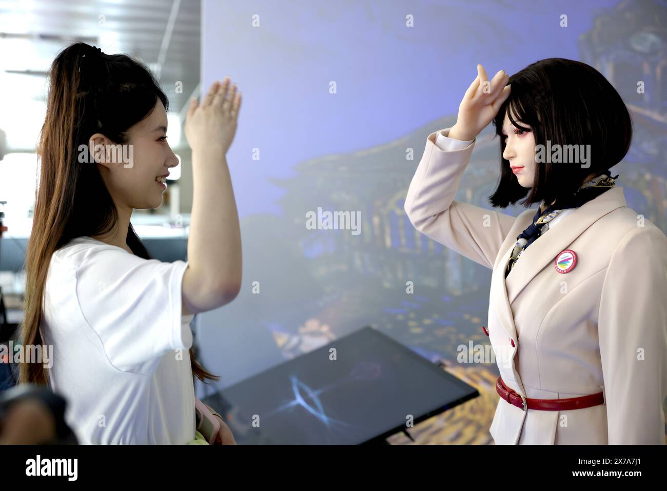 FUZHOU, CHINA - MAY 18, 2024 - Citizens interact with Netdragon AI ...