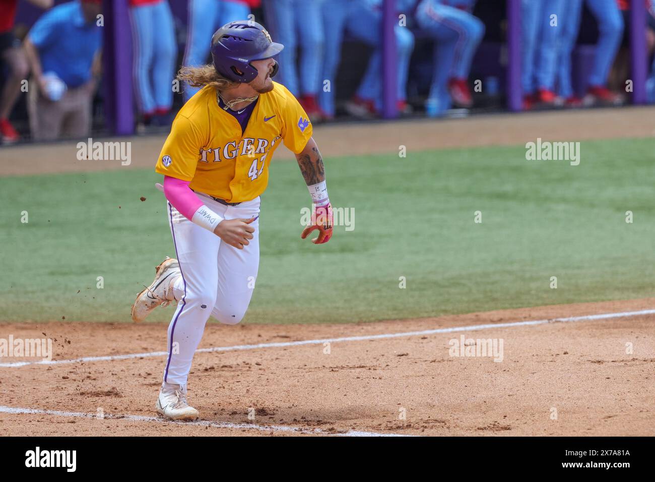 Baton Rouge, LA, USA. 18th May, 2024. LSU's Tommy White (47) watches ...