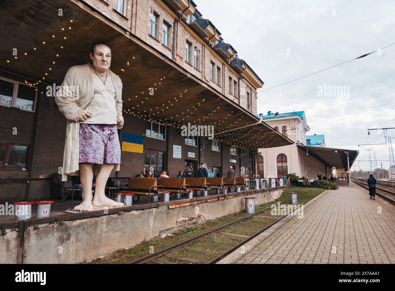 a 15-foot-tall Tony Soprano statue stands on a platform in front of a ...