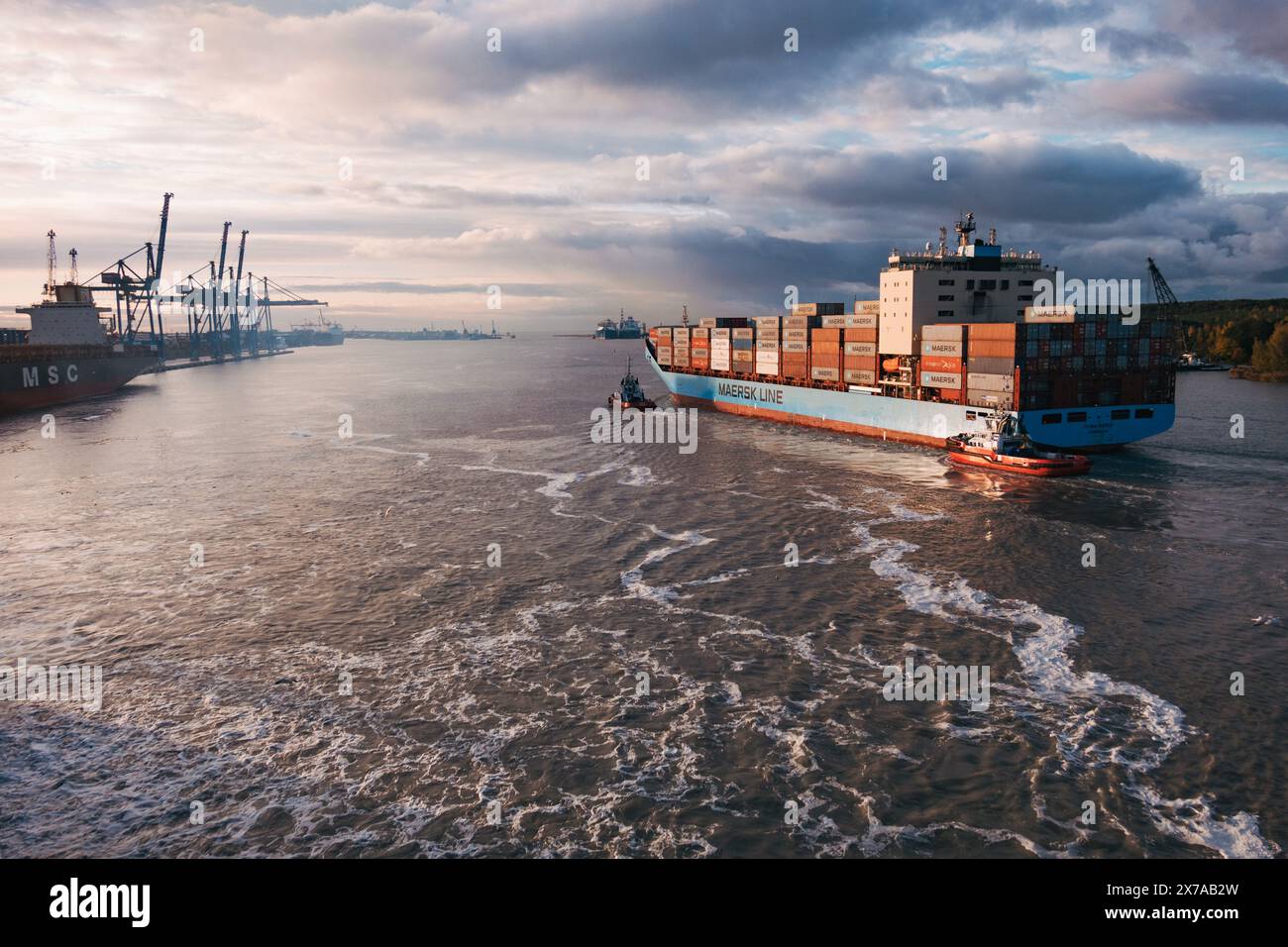 The Vilnia Maersk container ship is guided into Klaipeda port by tug ...