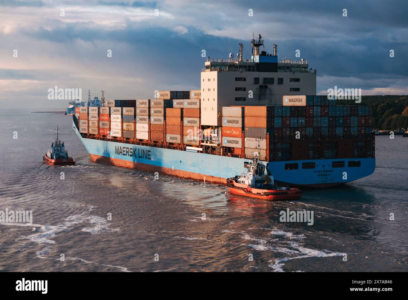 The Vilnia Maersk container ship is guided into Klaipeda port by tug ...