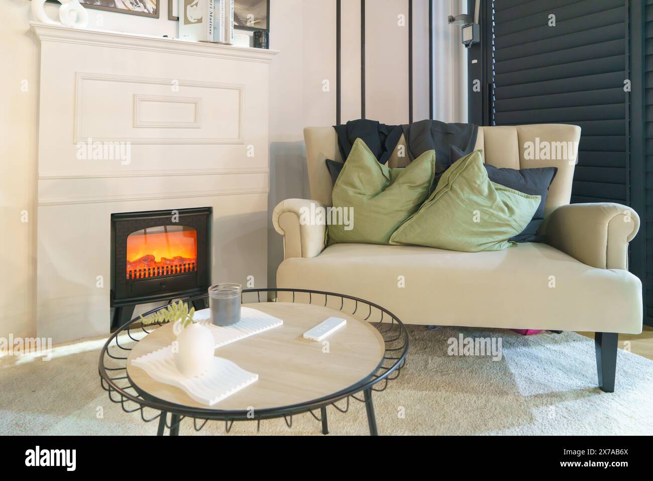 Warm and inviting living room featuring a comfortable sofa and a ...