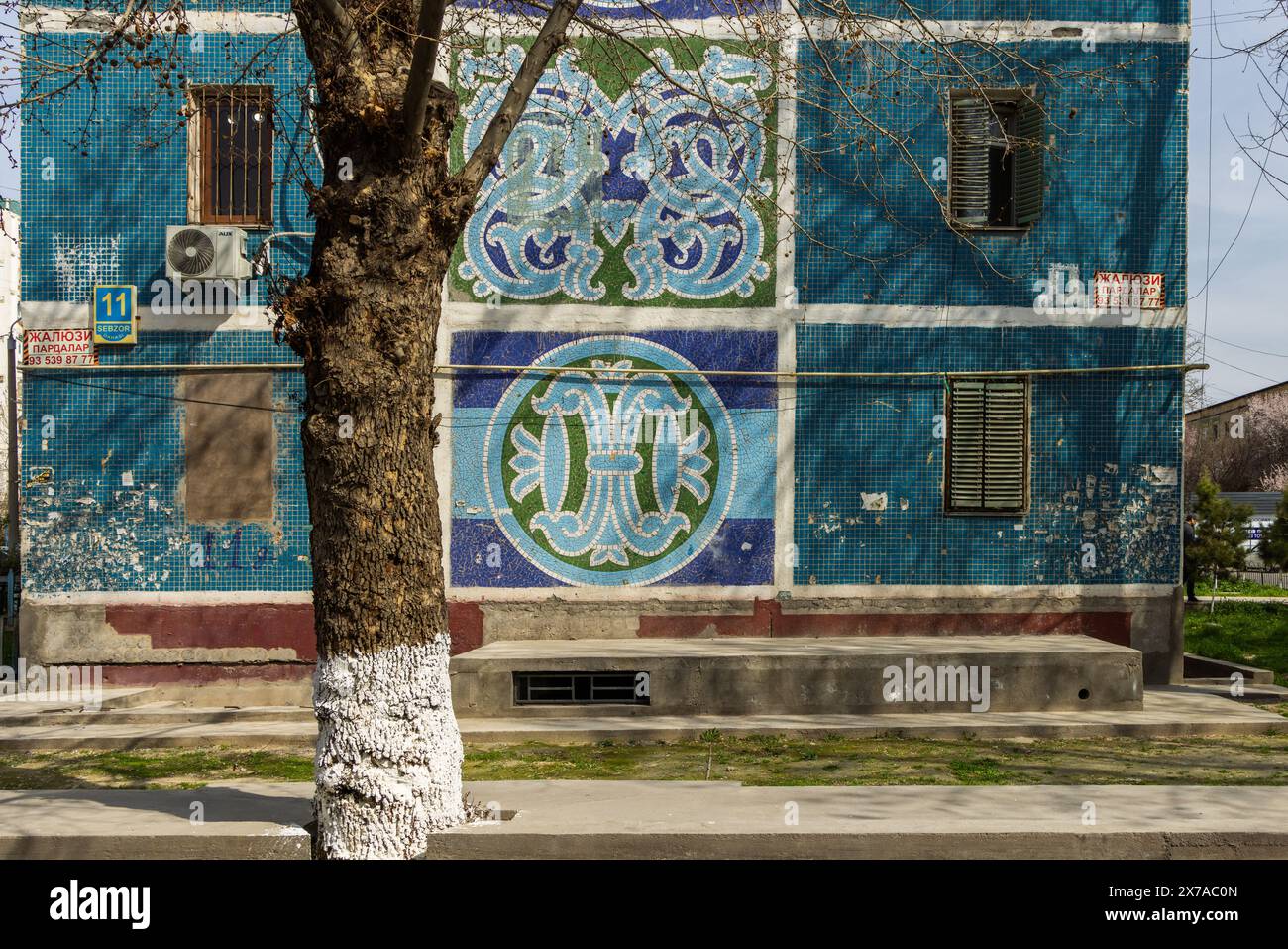 Soviet era mosaic facade on a residential apartment block, Tashkent ...