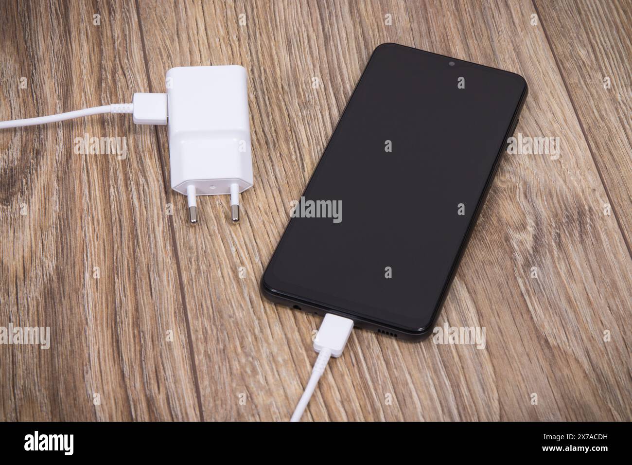 Smartphone, mobile phone and charger using to charge empty battery ...