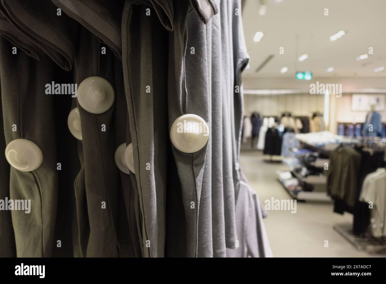 Security tags on clothes hi-res stock photography and images - Alamy