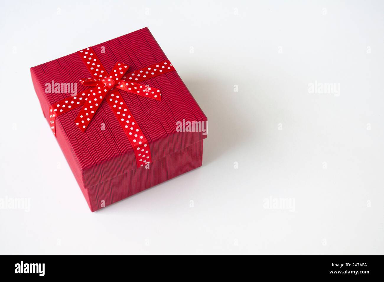 Top view of red color present on white background with customizable ...
