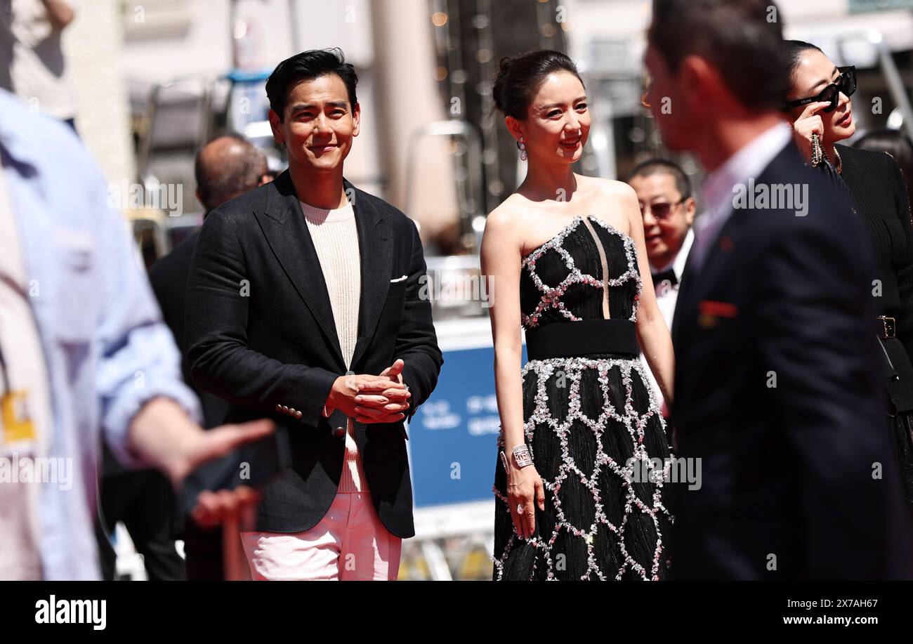 Cannes, France. 18th May, 2024. Actor Eddie Peng (L) and actress Tong ...