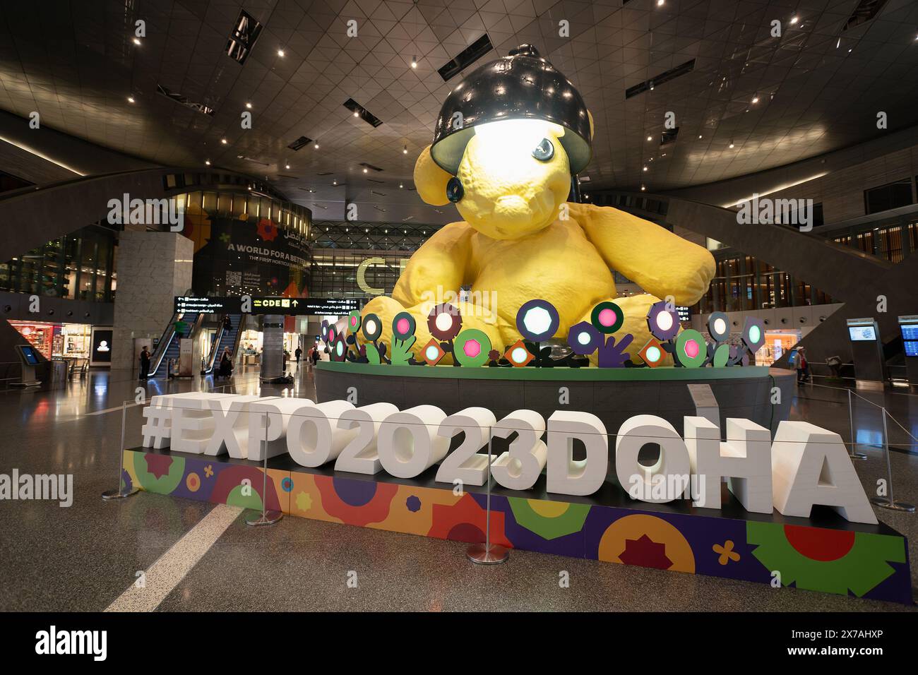 DOHA, QATAR - OCTOBER 13, 2023: Lamp Bear sculpture in Doha’s Hamad International Airport Stock ...