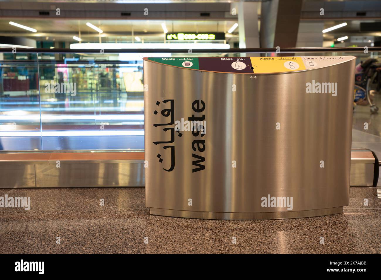 DOHA, QATAR - OCTOBER 13, 2023: trash containers are divided into waste ...
