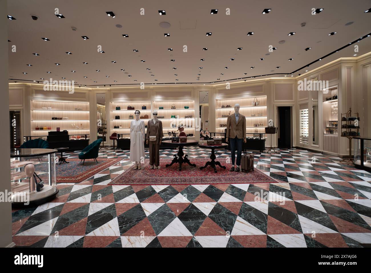 DOHA, QATAR - OCTOBER 13, 2023: interior shot of Gucci store in Hamad International Airport ...