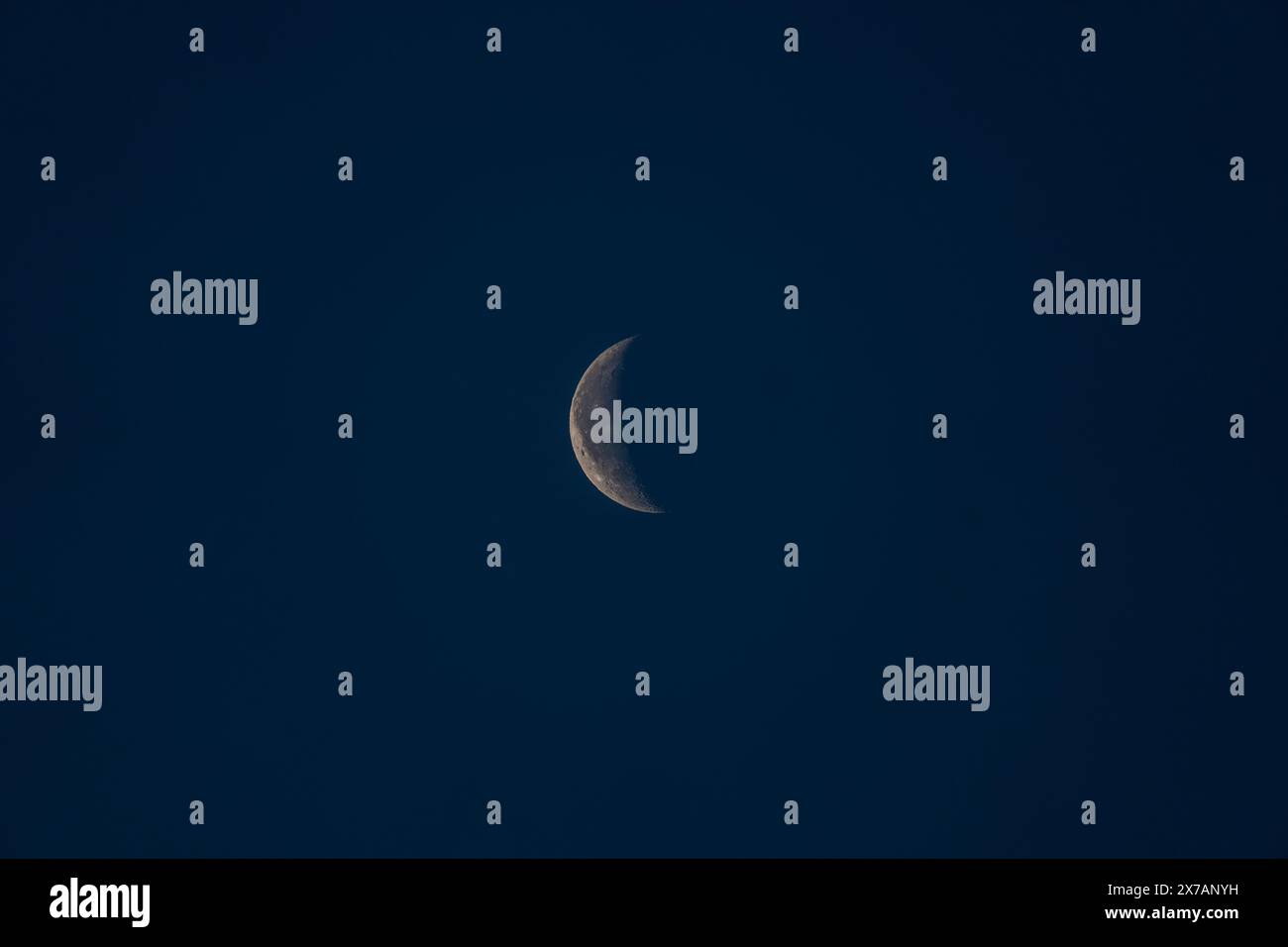 Perfectly detailed crescent moon with its craters and lunar seas on a ...