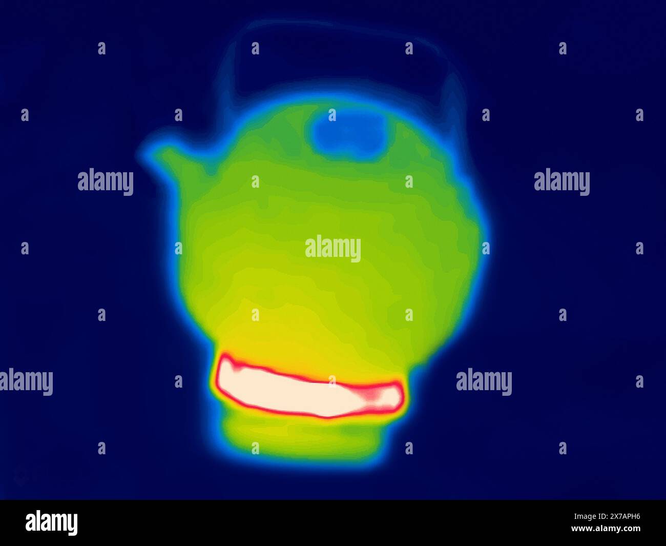Kettle is boiling on a gas stove. Modified Image from thermal imager ...