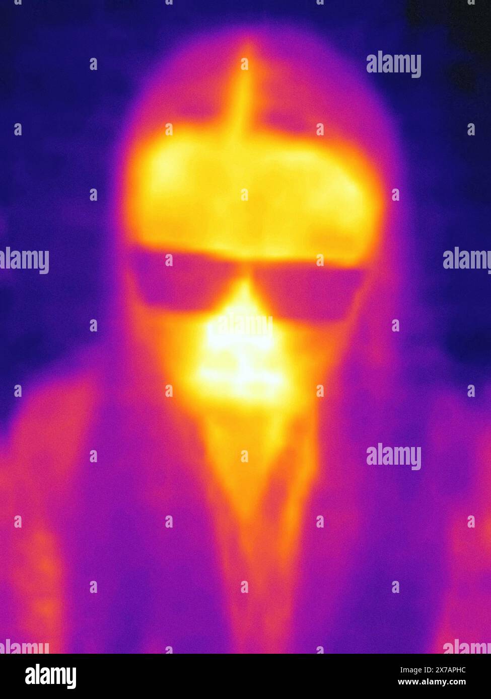 The image from the thermal imager device. Human heat map. Blurred ...