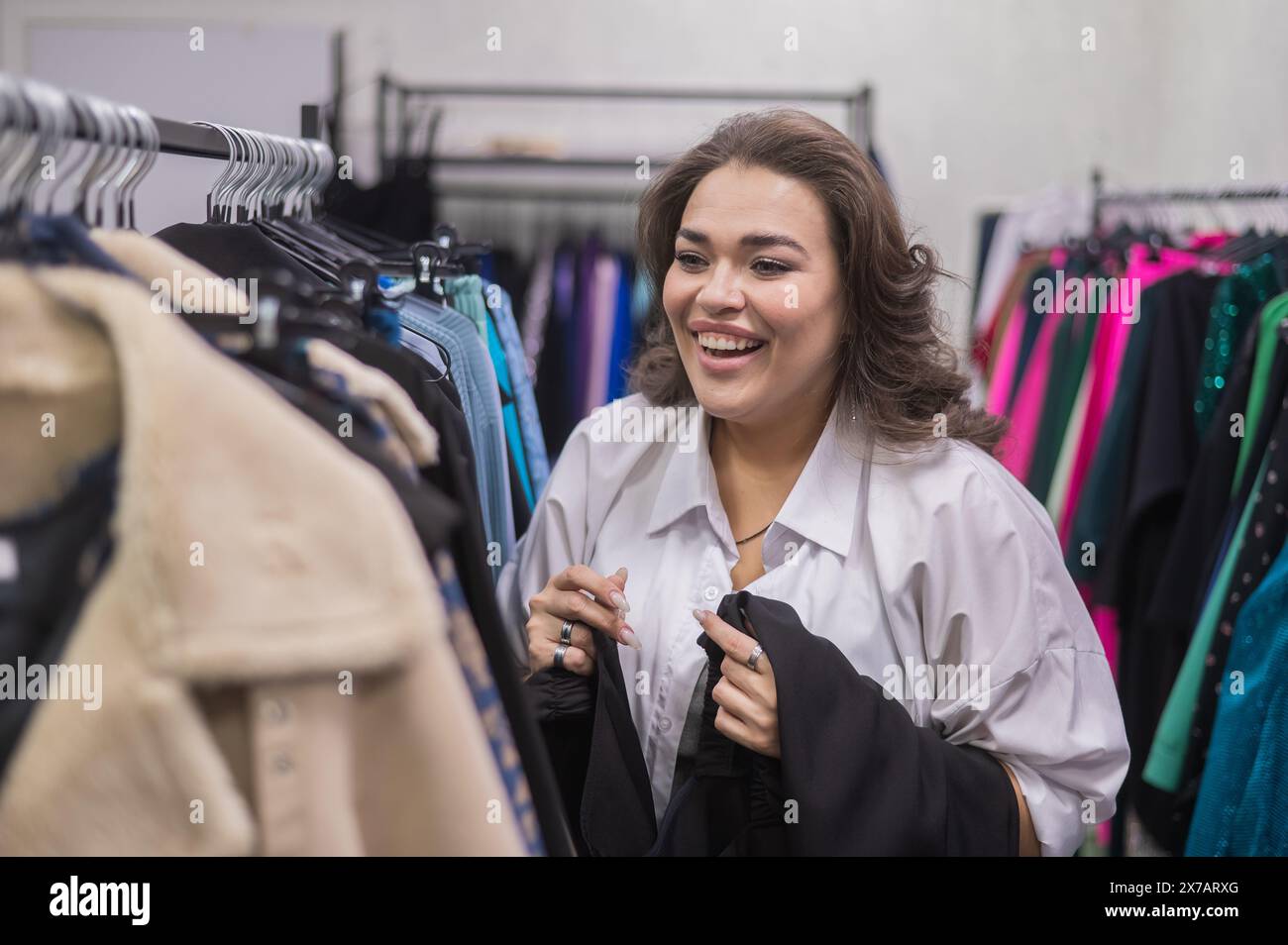 Portrait happy fat woman choosing hi-res stock photography and images ...