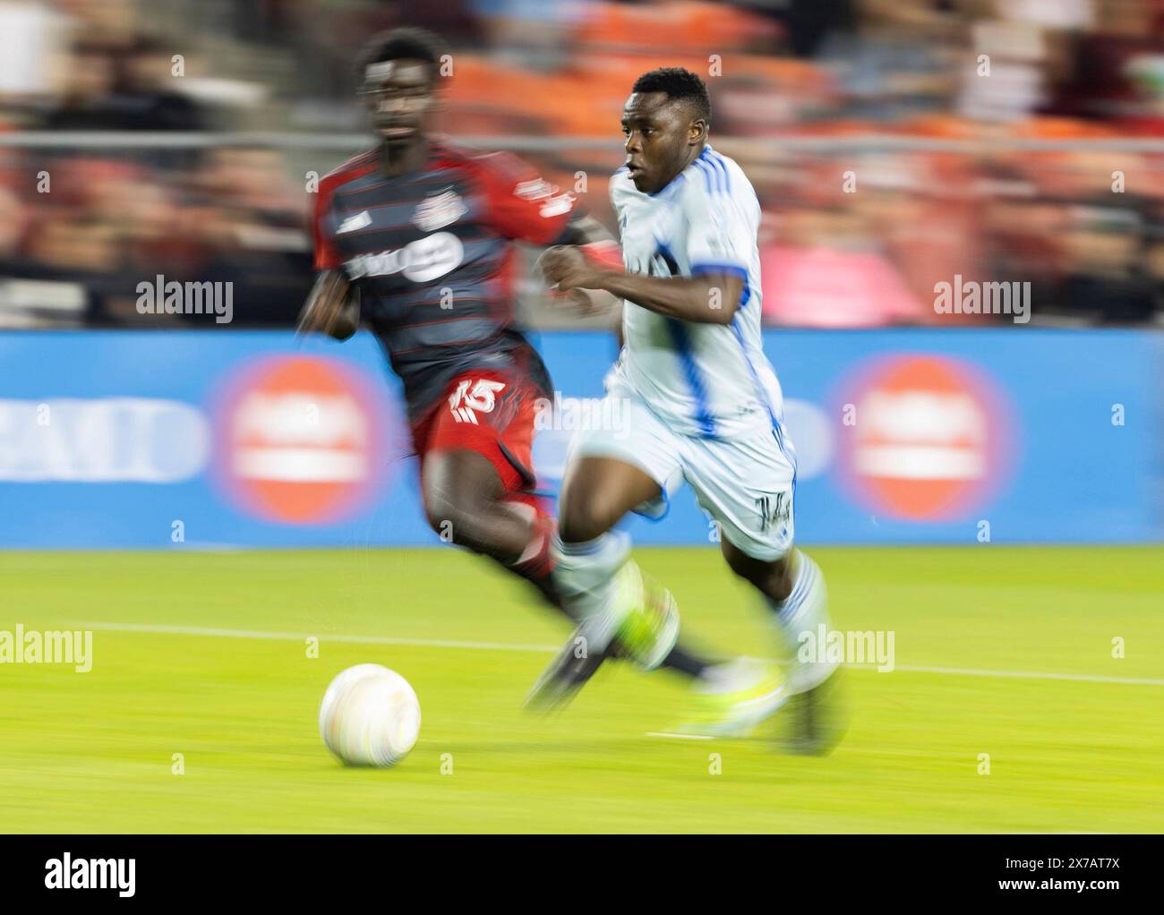 Toronto, Canada. 18th May, 2024. Sunusi Ibrahim (R) of CF Montreal ...