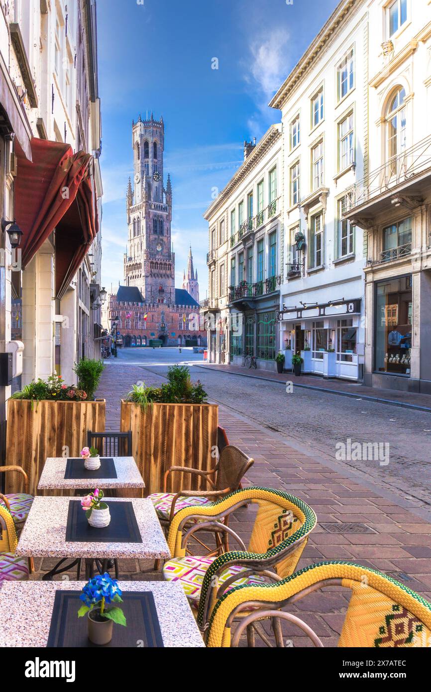 Bruges city historical center with empty narrow cobblestone street and ...