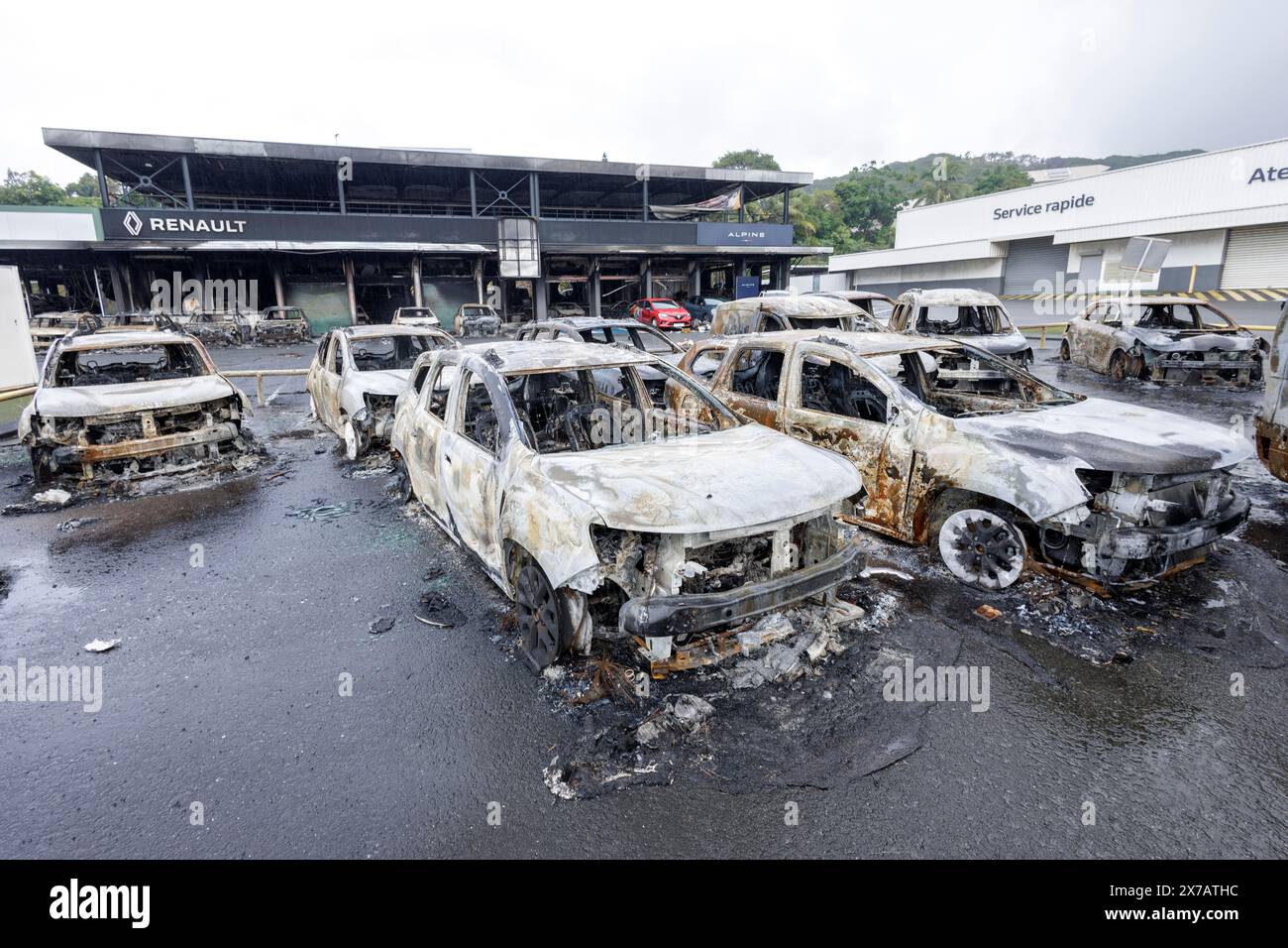 Aftermath of rioting at car dealerships in front of Magenta aerodrome ...