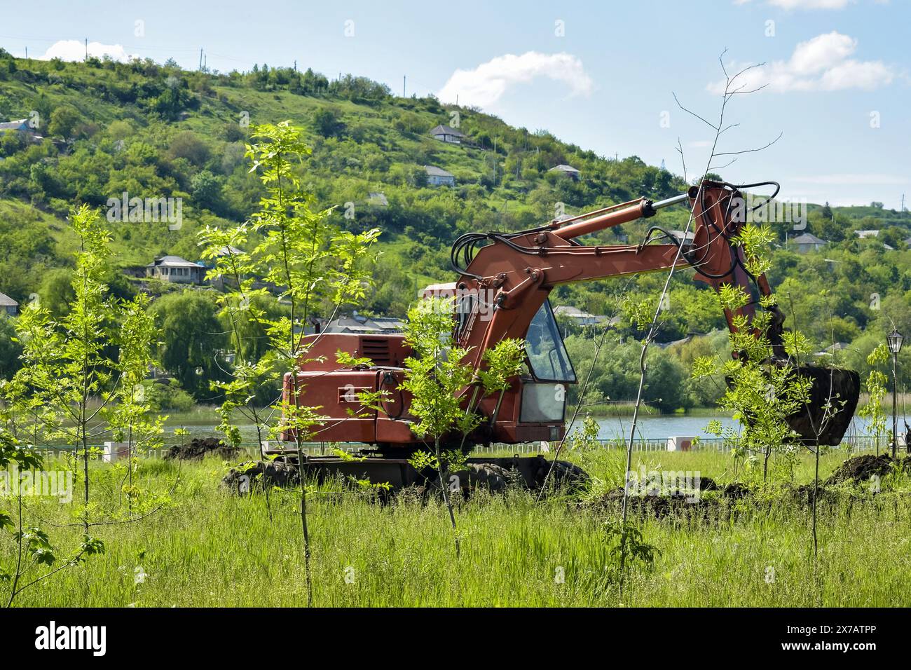 Red excavator hi-res stock photography and images - Alamy