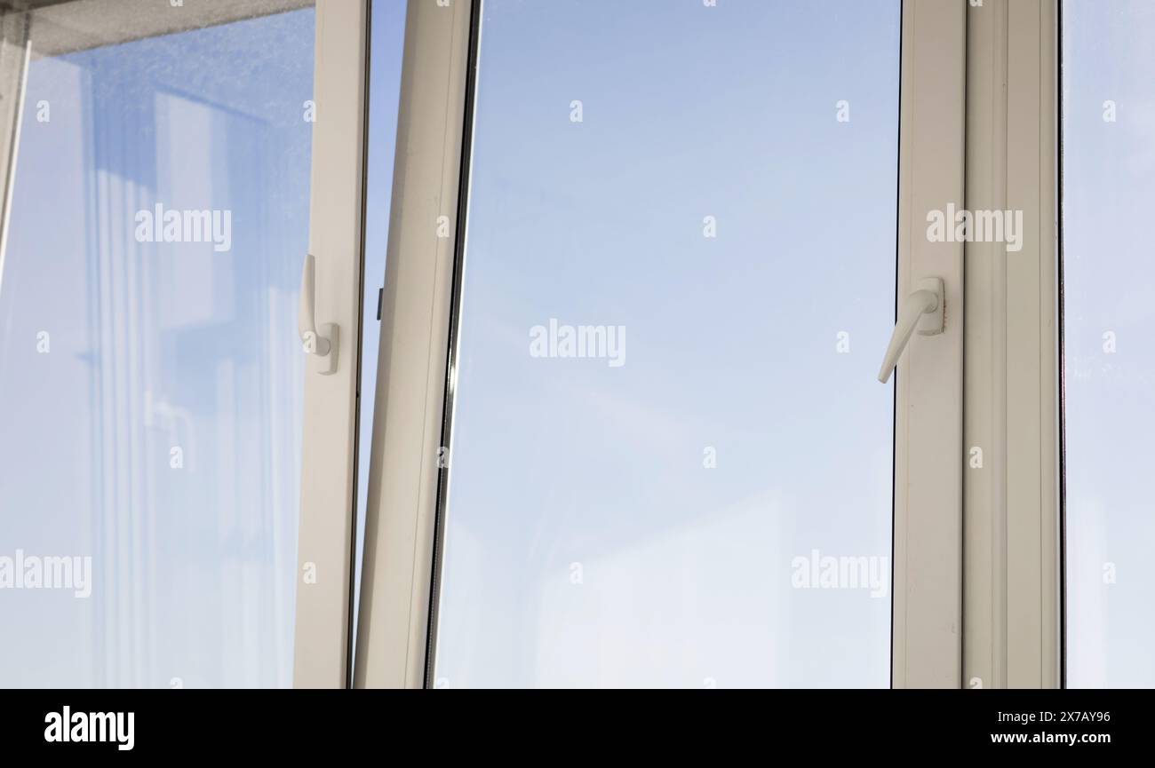 Fragment of open window pvc frame. ventilation of the room Stock Photo ...