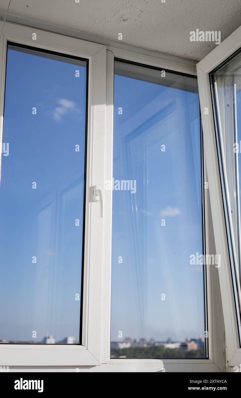 Plastic double glazed windows. White plastic window profile Stock Photo ...