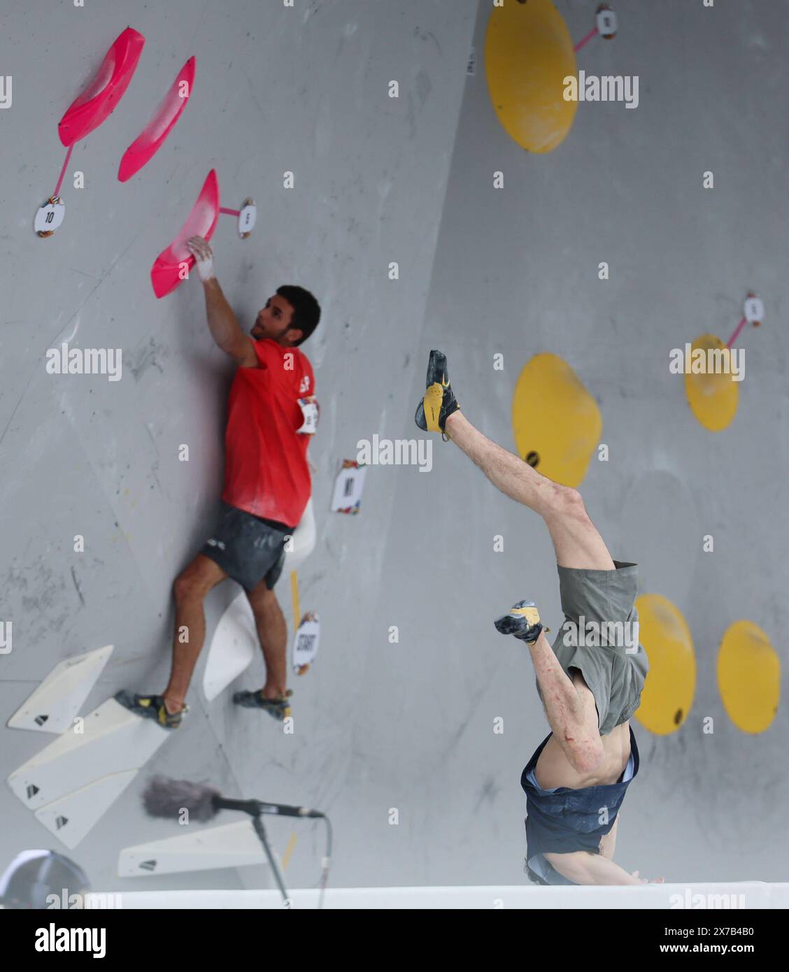 Shanghai. 19th May, 2024. Hamish Mcarthur (R) of Britain falls in the ...
