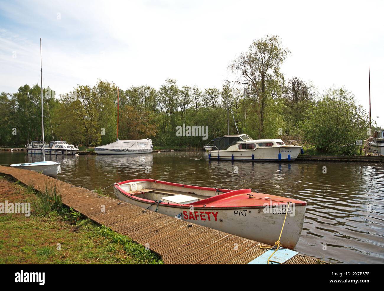 A safety boat moored by the Norfolk Punt Club on the Norfolk Broads at ...