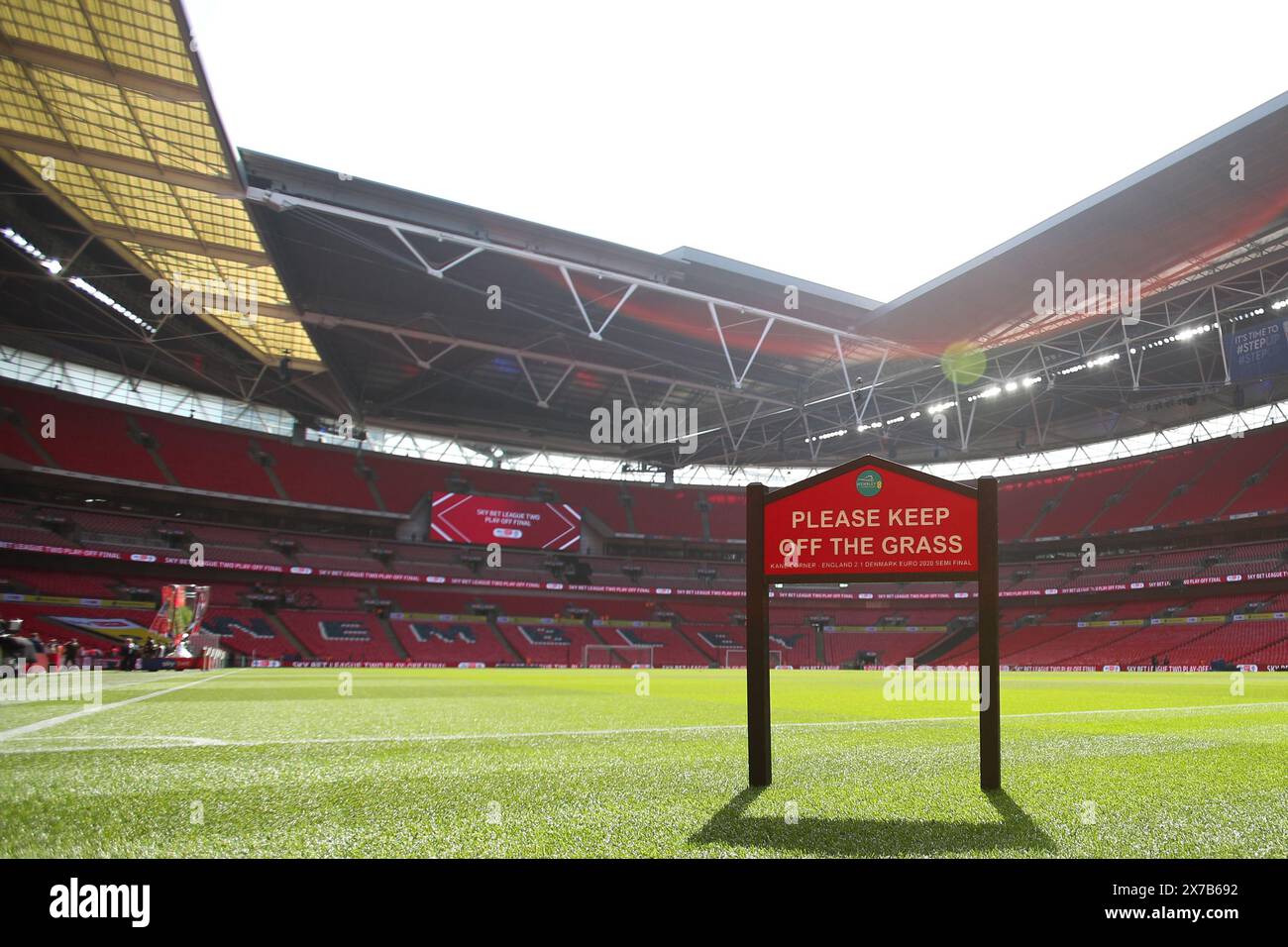 A general view of a please keep of the grass sign at Wembley Stadium ...