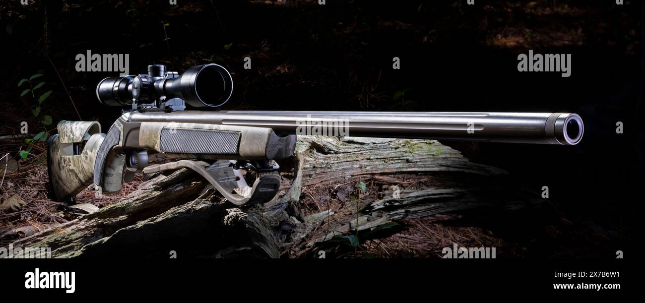 Inline muzzeloader rifle with optic for modern hunting Stock Photo - Alamy