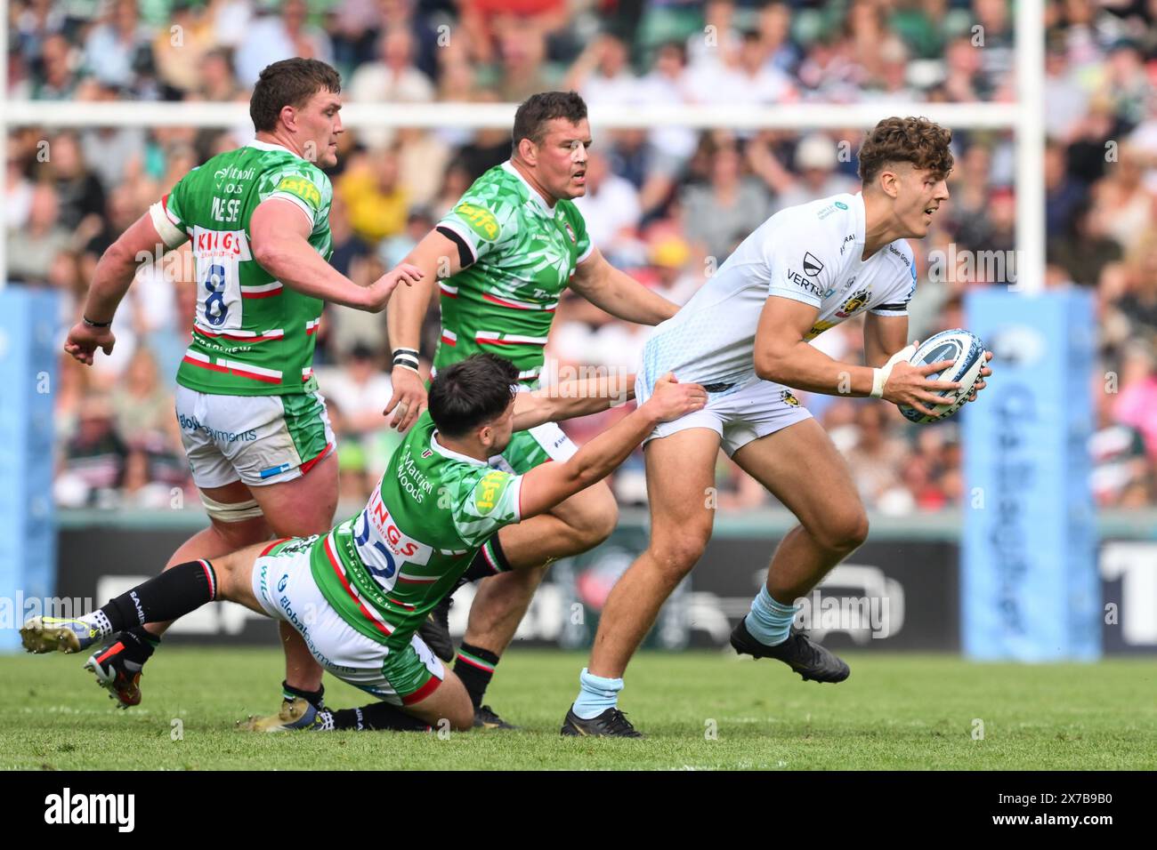 Zack Wimbush of Exeter Chiefs is tackled by Kieran Wilkinson of ...