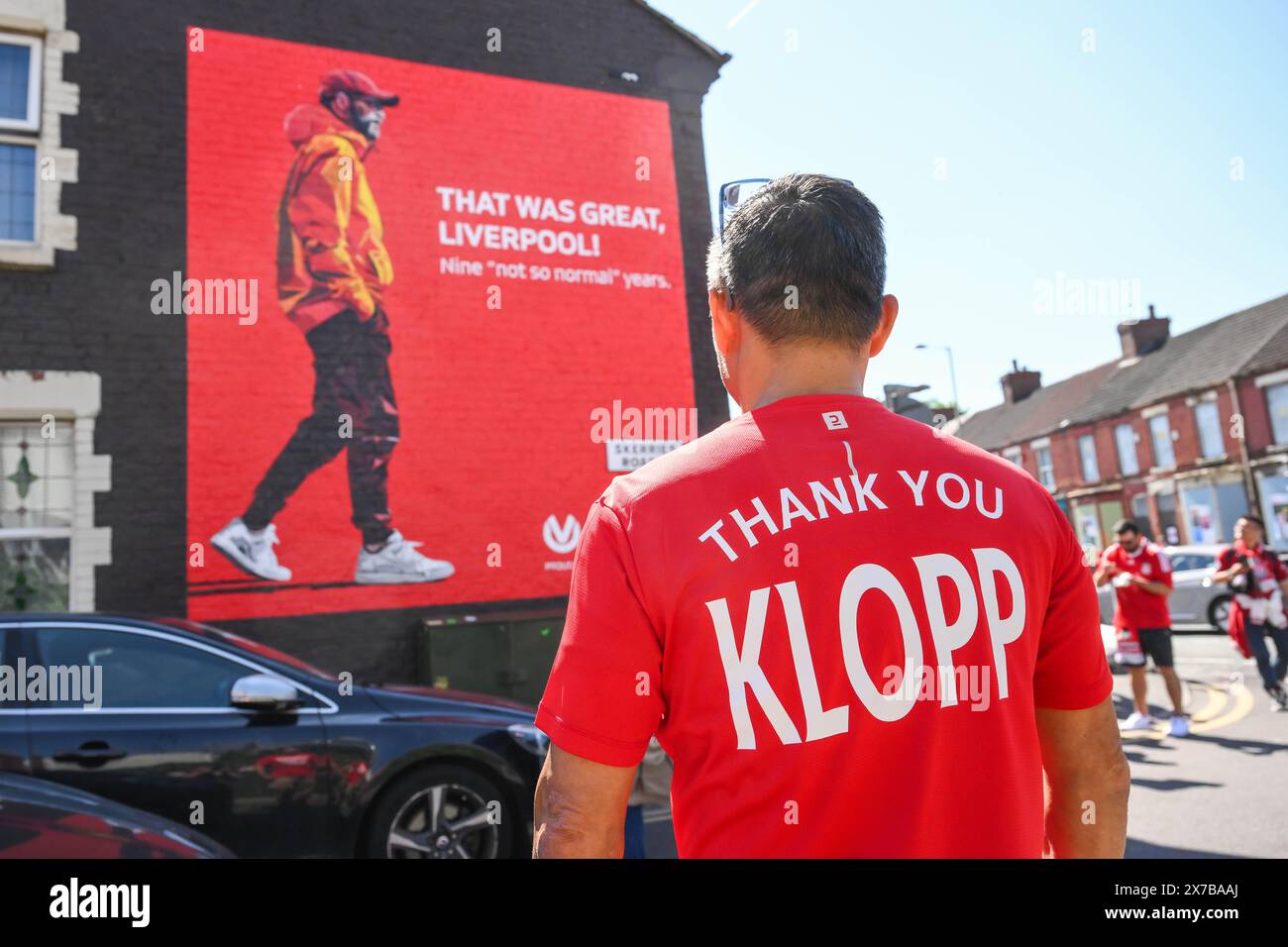 A fan with Thank you Klopp looks at the Jürgen Klopp Manager goodbye ...
