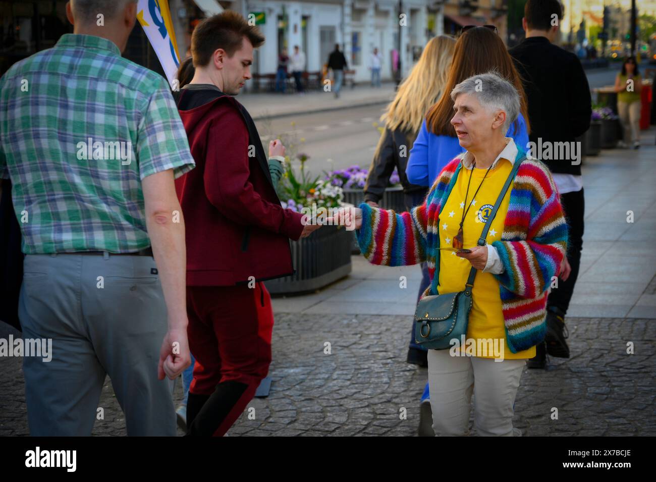Handing out flyers hi-res stock photography and images - Alamy